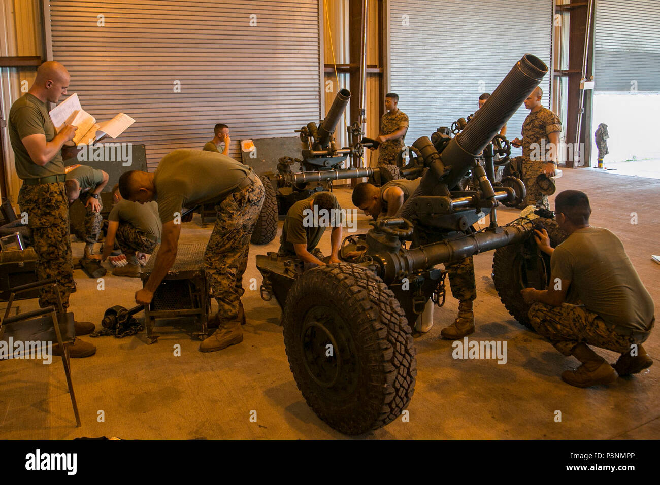 Marines perform maintenance on 120mm Mortars July 11 aboard Combined ...