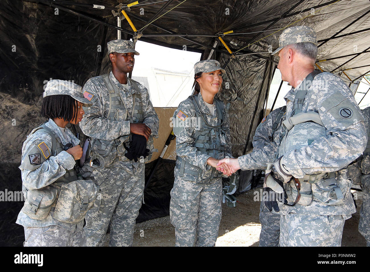 Col. Robert Cooley, right, deputy commander of the 85th Support Command ...