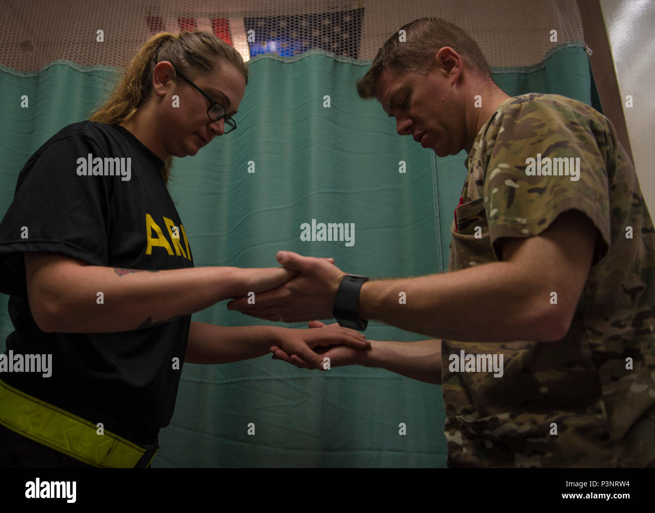 Maj. Brandon Morgan (right), 455th Expeditionary Medical Group physical ...