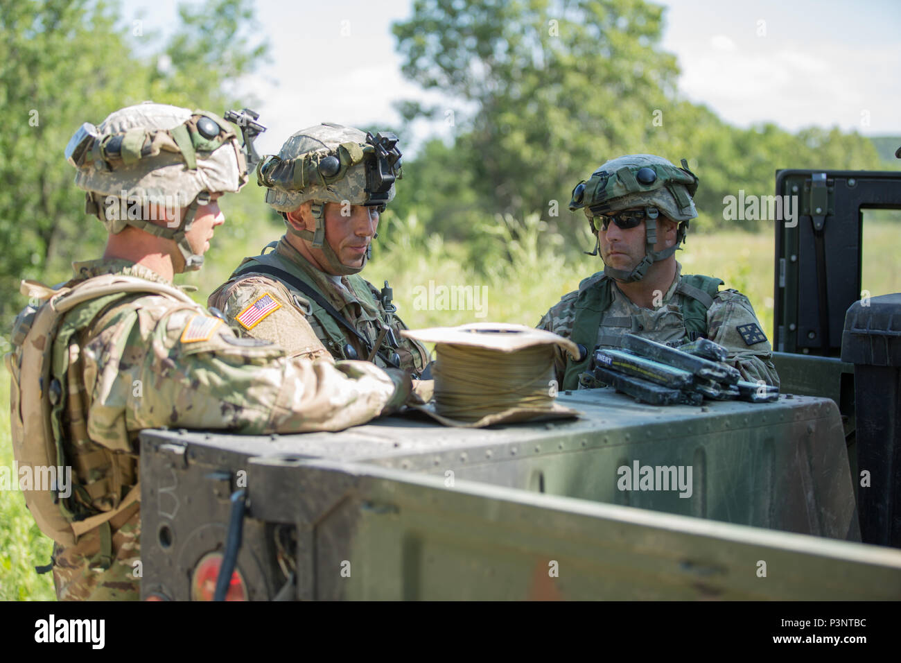 U.S. Army Sgt. Cody Canipe (middle), 366th Engineer Company, Pension, N ...