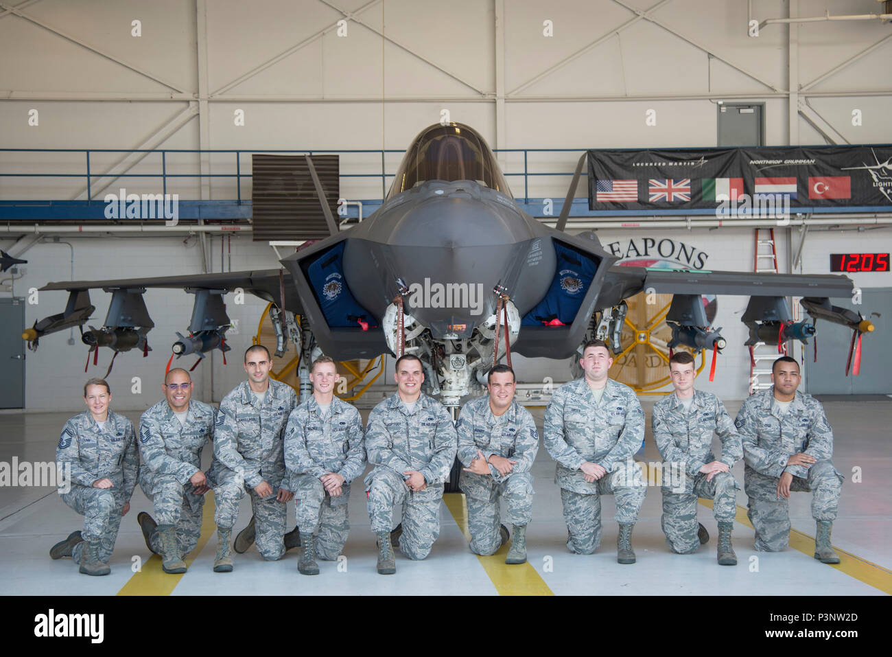 Airmen from the 33rd Aircraft Maintenance Squadron pose for a photo ...