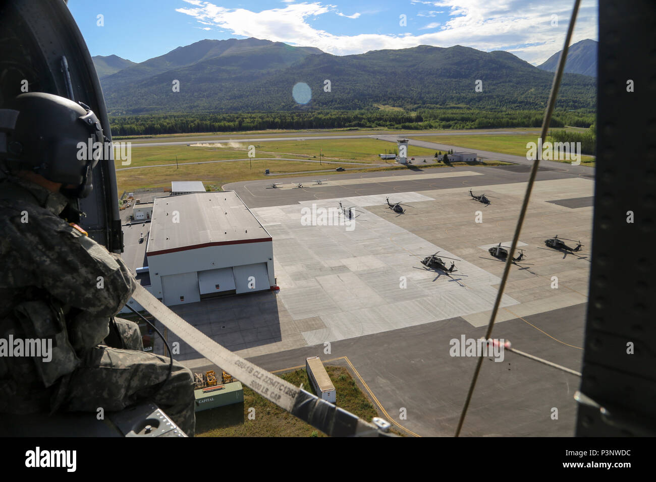 Sgt. Adam Weber, a crew chief with A Co., 1st Battalion, 207th Aviation ...