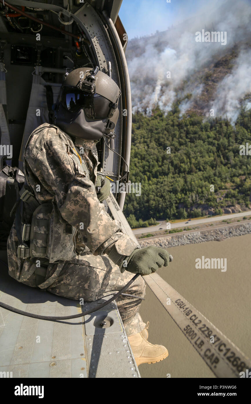 Sgt. Adam Weber, a crew chief with A Co., 1st Battalion, 207th Aviation ...