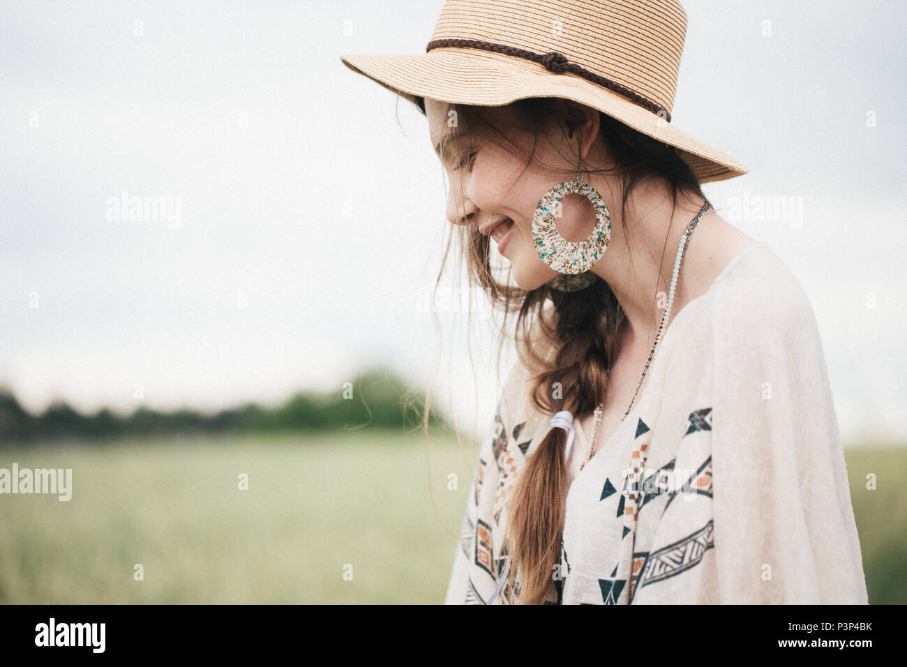 Girl in eco style clothes posing in nature background. Portrait of ...