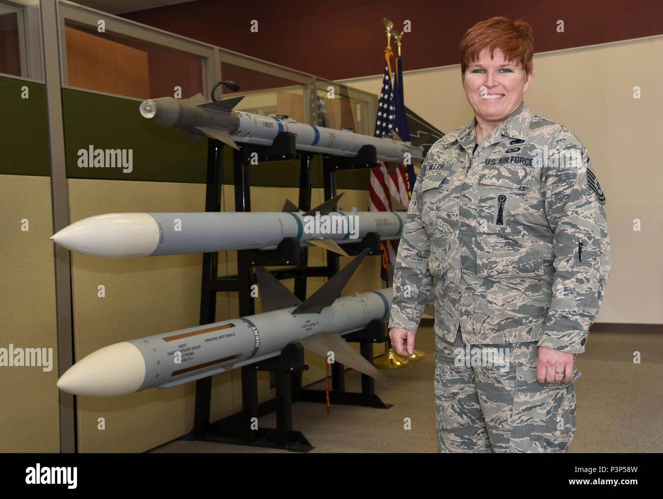 Oregon Air National Guard Chief Master Sgt. Kristen Miller pauses for a ...