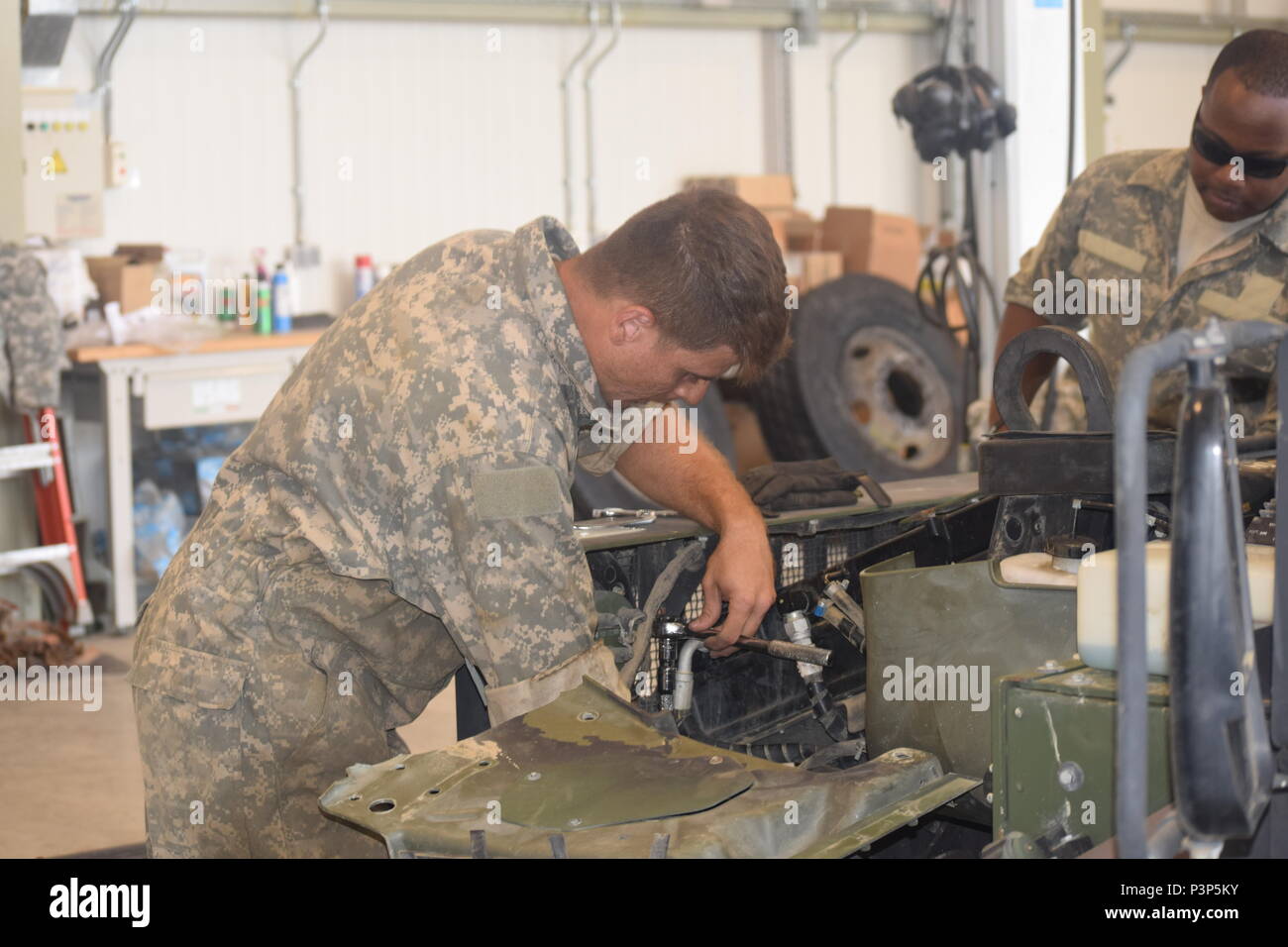 Sgt. Yulgye Echavarra and Pvt. 1st class Roshawn Hayles, mechanic ...