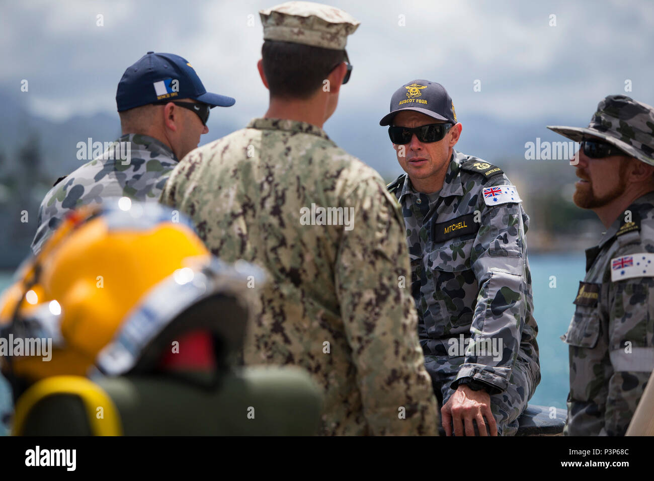 Chief Petty Officer Clearance Diver Drew Mitchell (centre) and Chief ...
