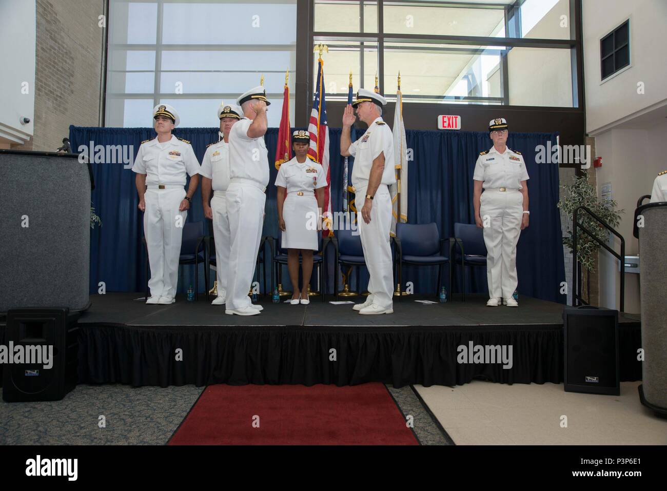 160715-N-GZ984-078 – Cmdr. Jason Lewis renders a salute to Capt ...
