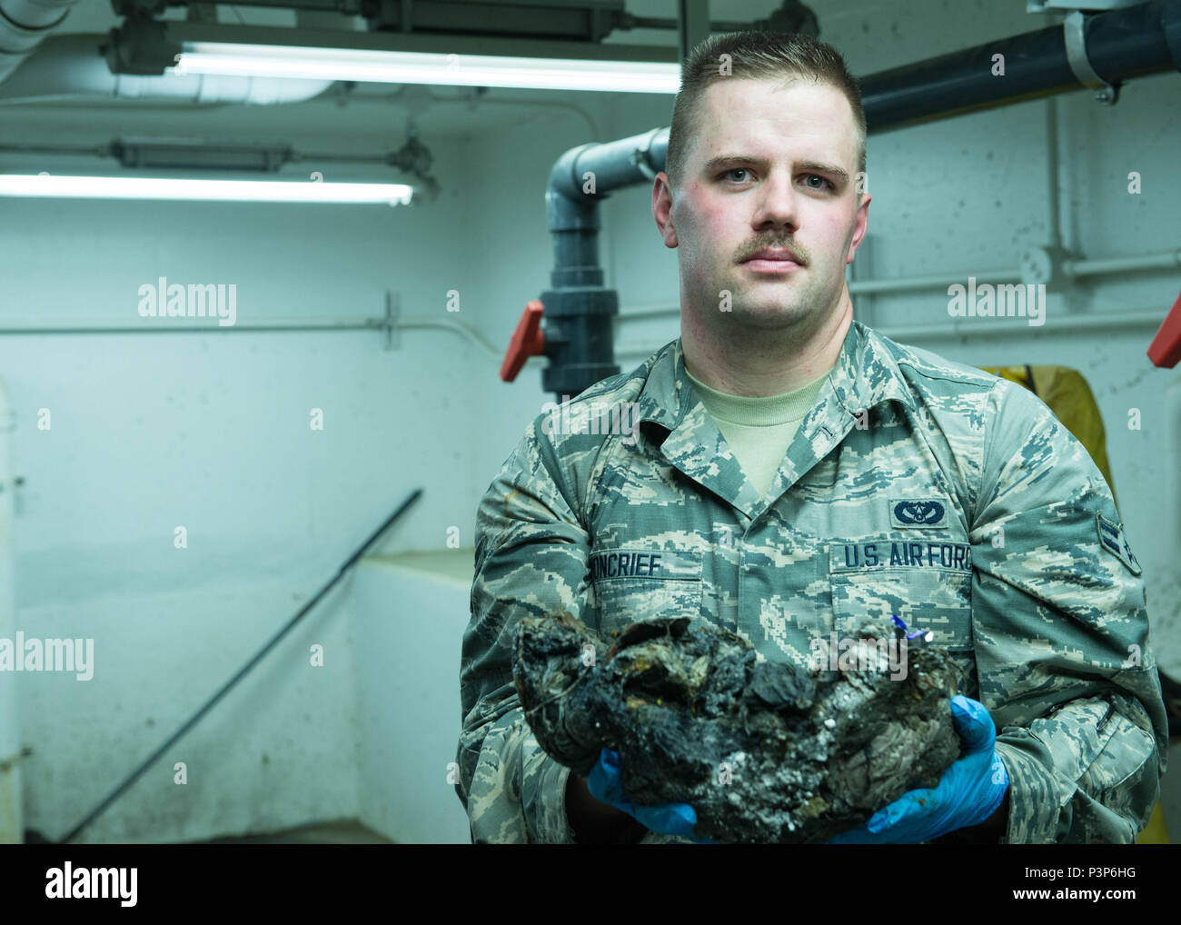 U.S. Air Force Airman 1st Class Troy Moncrief, a 354th Civil ...