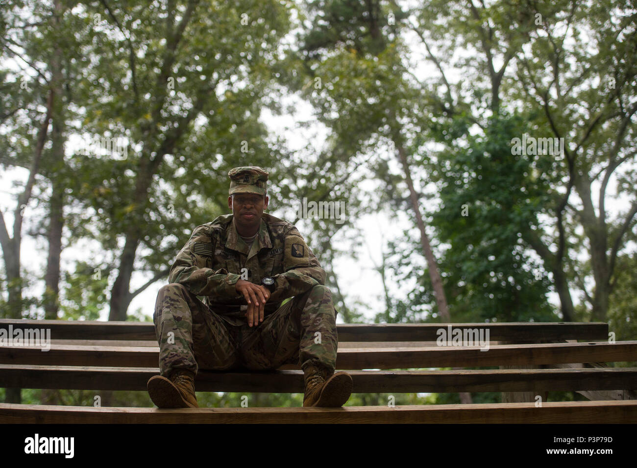 U.S. Army 1st Sgt. Endesha Johnson, 55th Signal Company, sits on top of ...