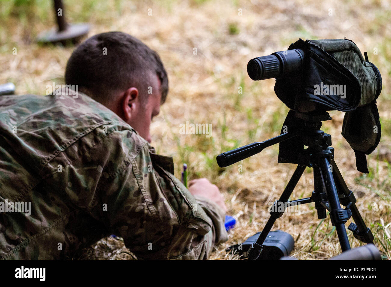 A Soldier from the scout squad of Headquarters and Headquarters Company ...