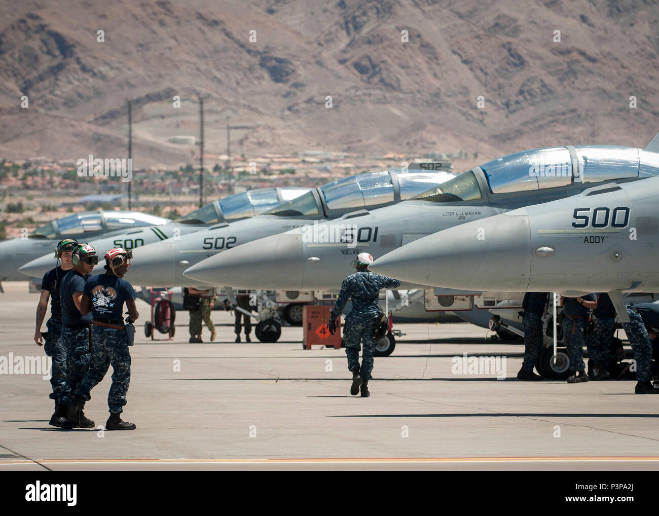 Navy personnel from the Electronic Attack Squadron-139 perform ...