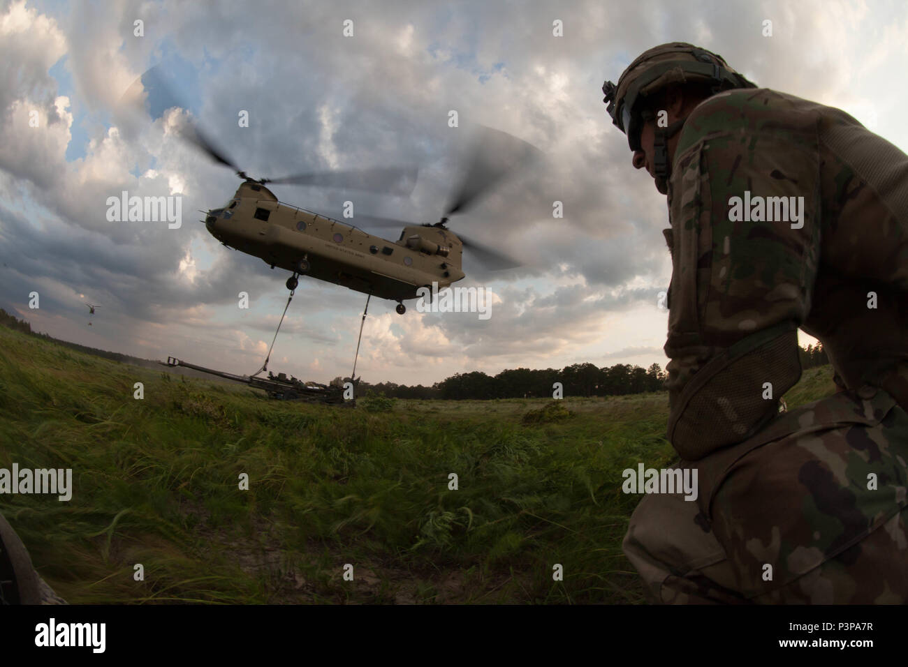 CH-47 Chinook Helicopters conduct sling load operations in support of Division Artillery ...