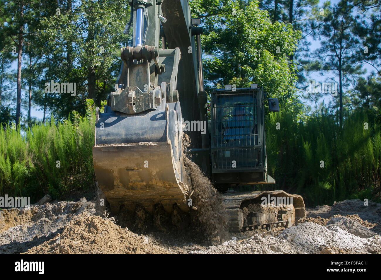 A heavy equipment operator with Marine Wing Support Squadron 471 ...
