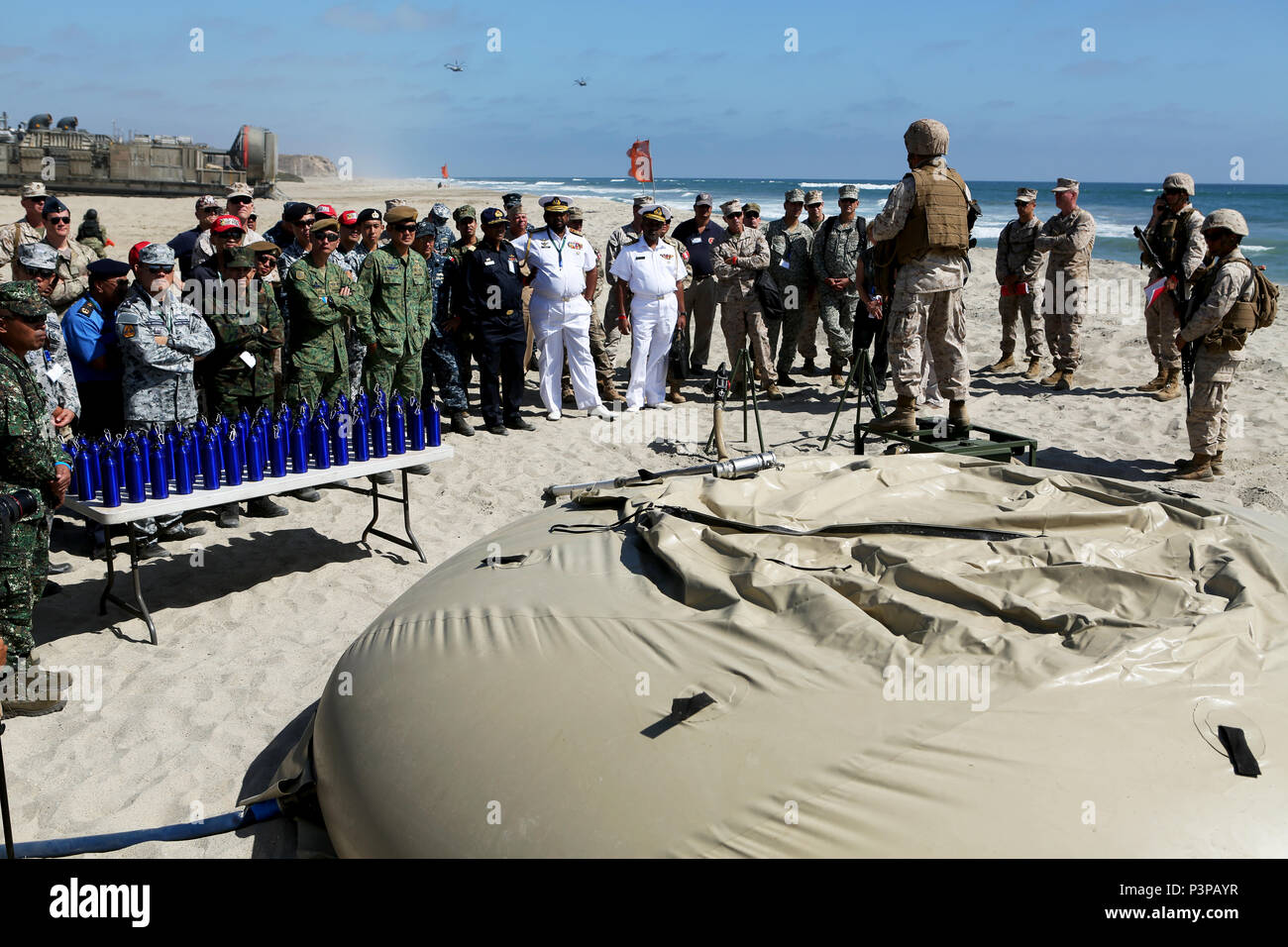 U.S. Marine Staff Sgt. Jose Ledesma explains the Tactical Water ...