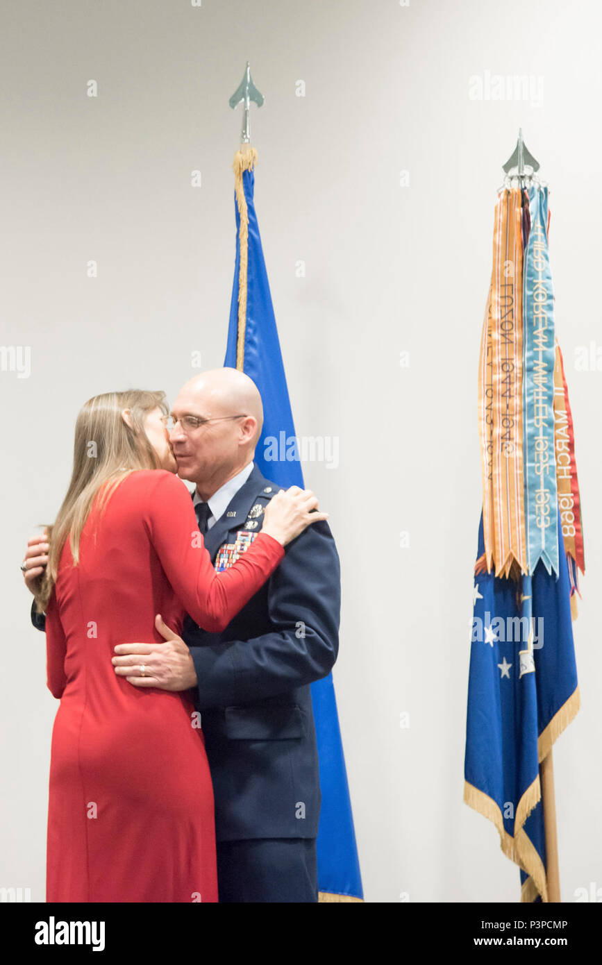 Col. Lisa Manion hugs her husband, Col. Michael Manion, former 403rd ...