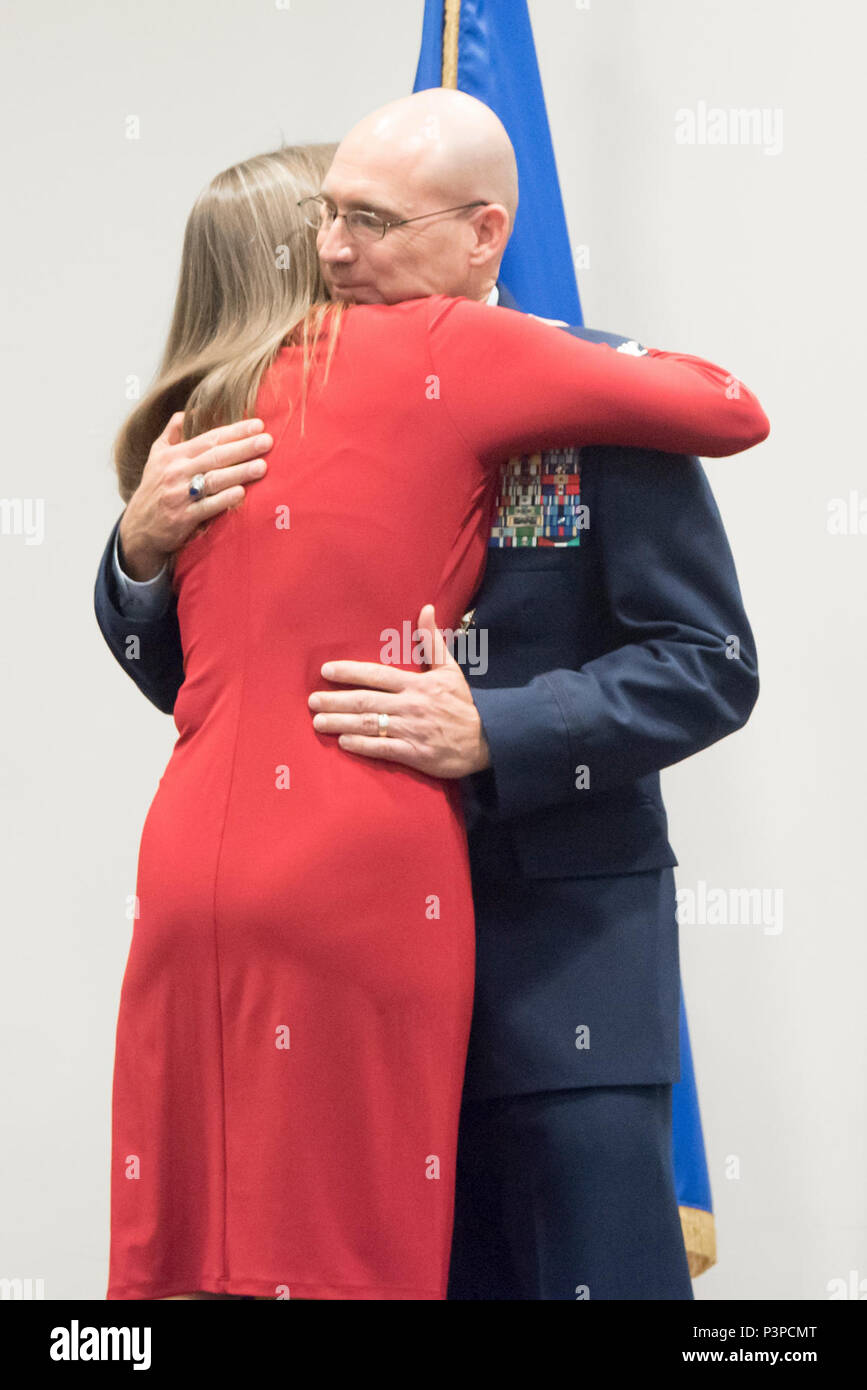 Col. Lisa Manion hugs her husband, Col. Michael Manion, former 403rd ...