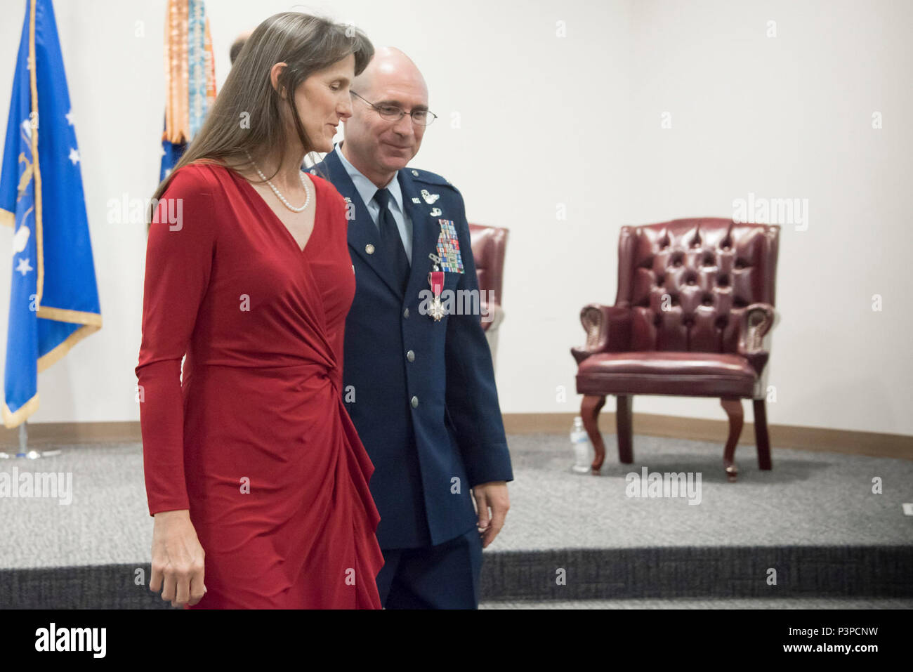 Col. Michael Manion, former 403rd Wing commander, walks his wife, Col ...
