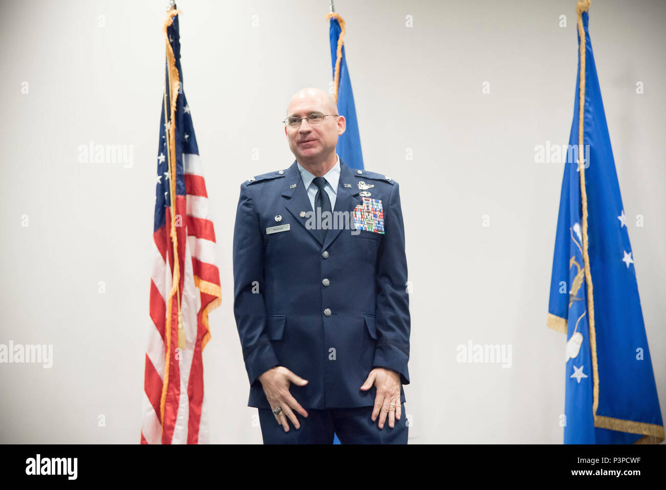 Col. Michael Manion, former 403rd Wing commander, speaks during his ...
