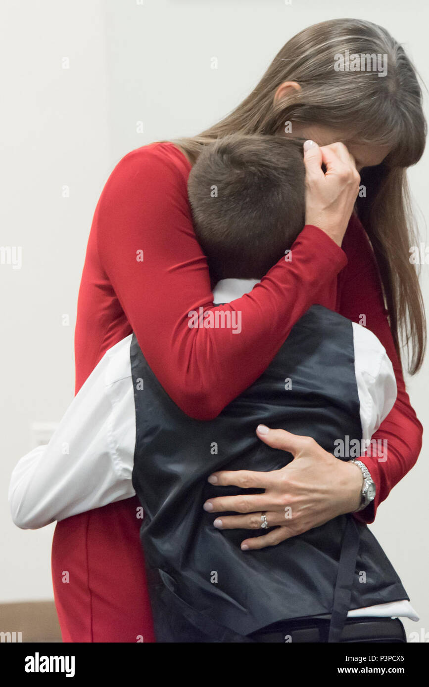 Col. Lisa Manion hugs her son during the retirement ceremony of her ...