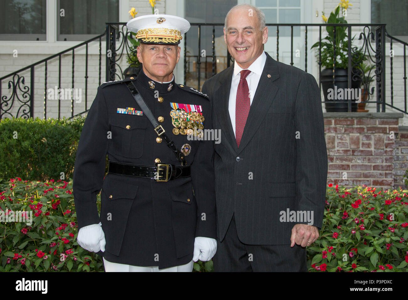 Commandant of the Marine Corps Gen. Robert B. Neller, left, poses for a ...