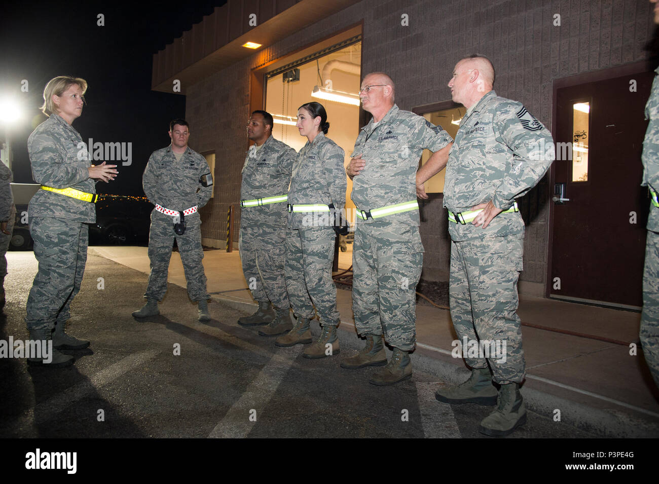 Col. DeAnna Burt, Air Expeditionary Wing commander, engages with the ...