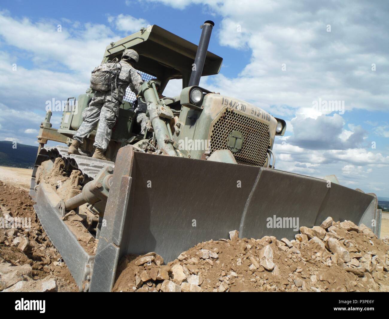 U.S. Army Reserve soldier, Spc. Juan Ayuso receives direction from Sgt ...