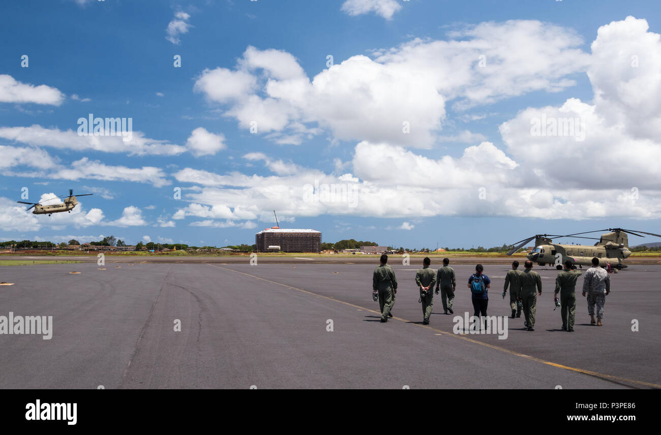 Indonesian-Angkatan aviation officers head towards the flight line ...