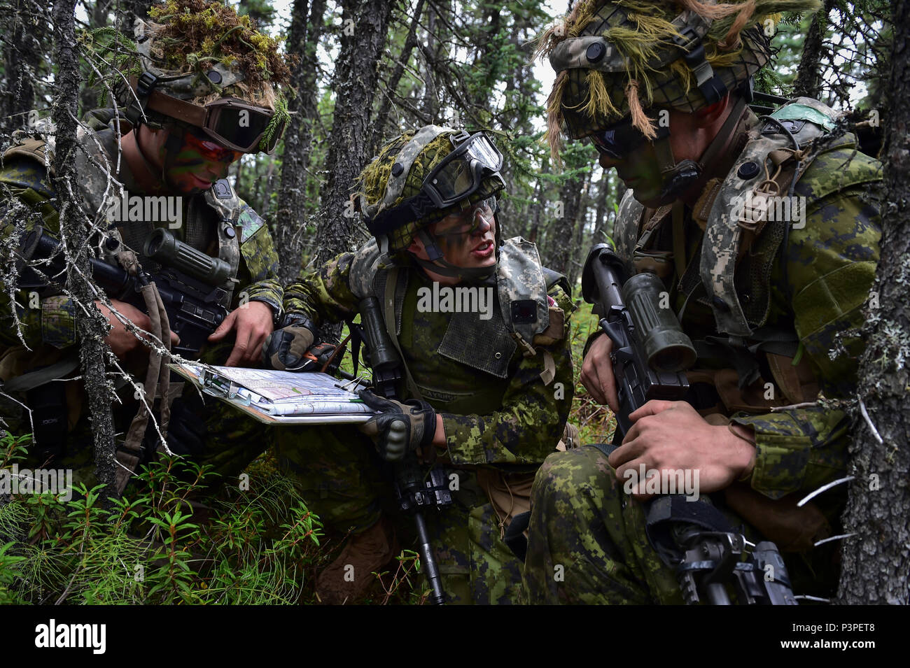 Canadian Army Maj. Chelsea Anne Braybrook, center, commander of Bravo ...