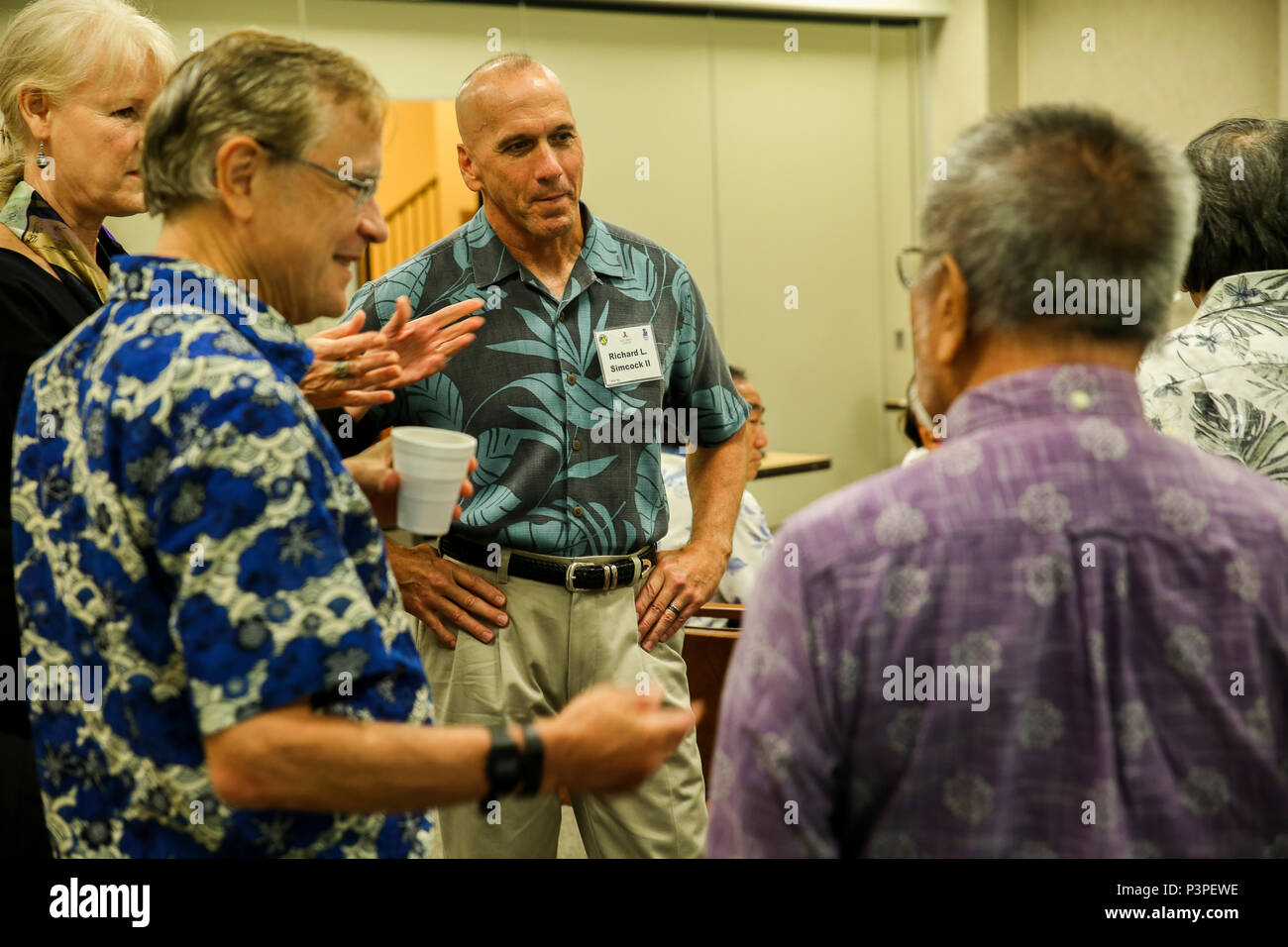 U.S. Marine Corps Maj. Gen. Richard L. Simcock II, middle, discusses ...