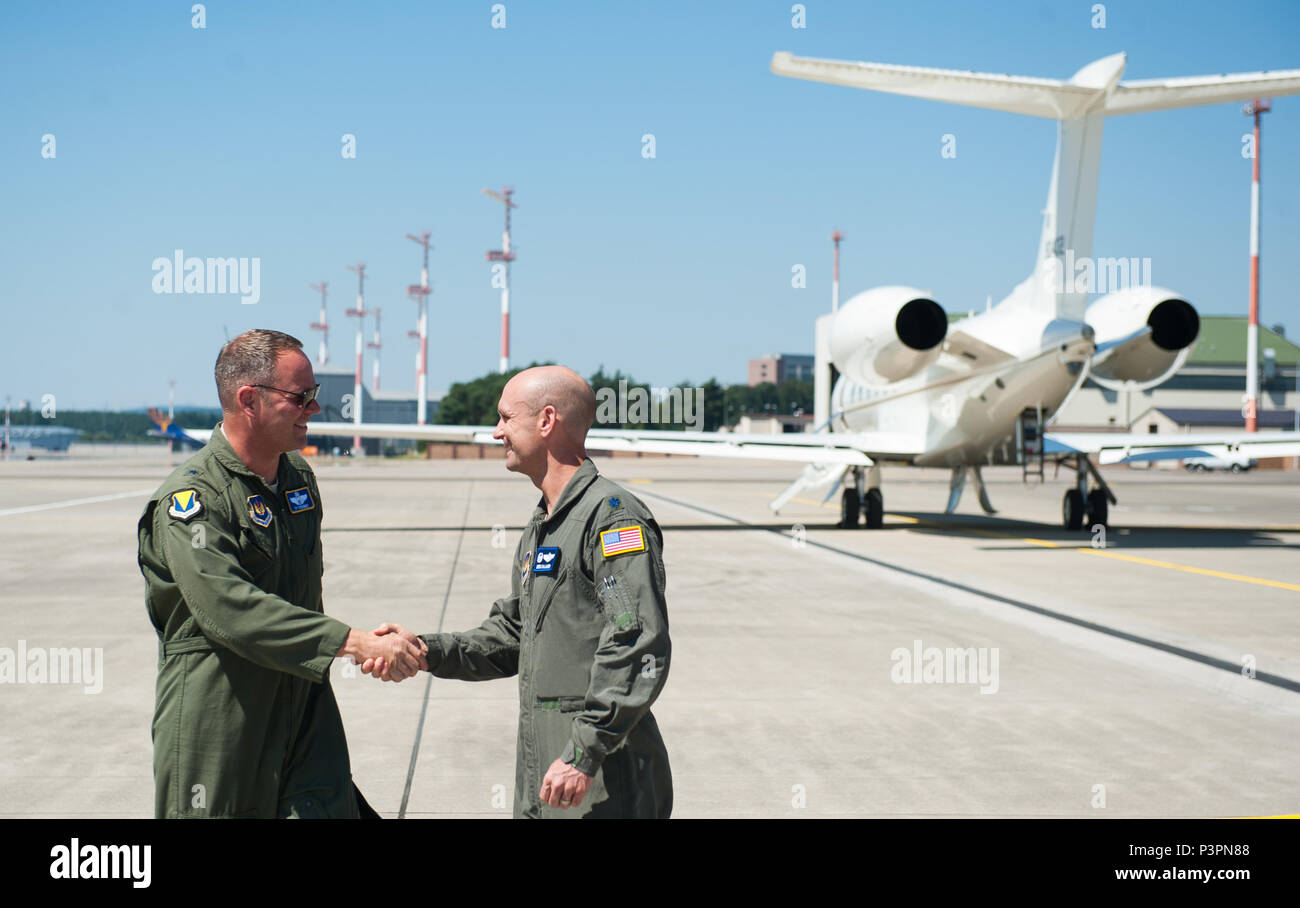 Brig. Gen. Jon T. Thomas, 86th Airlift Wing commander, greets Lt. Col ...