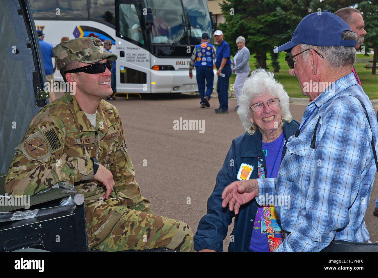 Capt. Robert Meeks, 40th Helicopter Squadron UH-1N Iroquois pilot, left, speaks with members ...