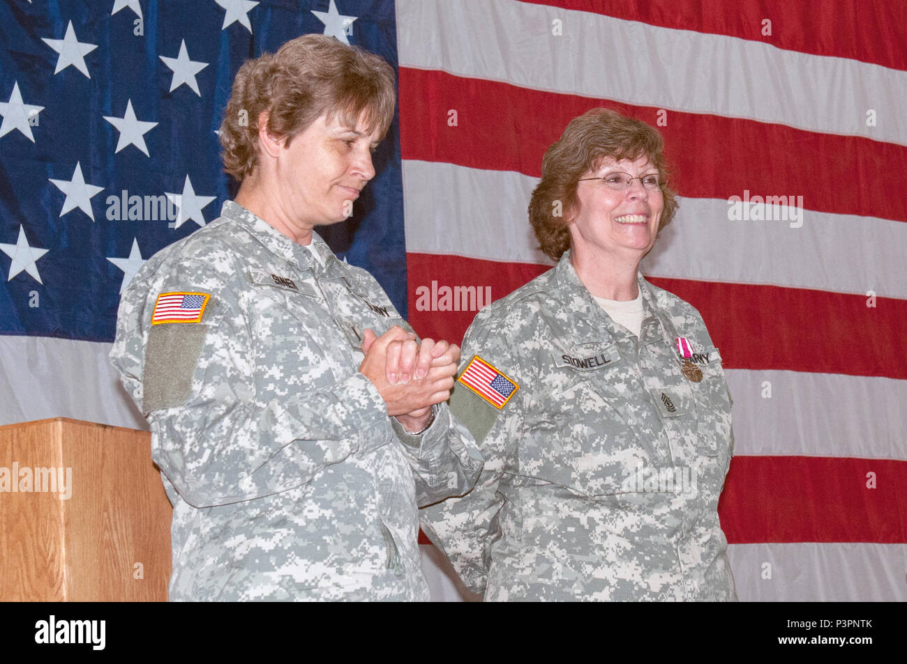 U.S. Army Chief Warrant Officer 5 Kim Siner (left), assigned to Joint ...
