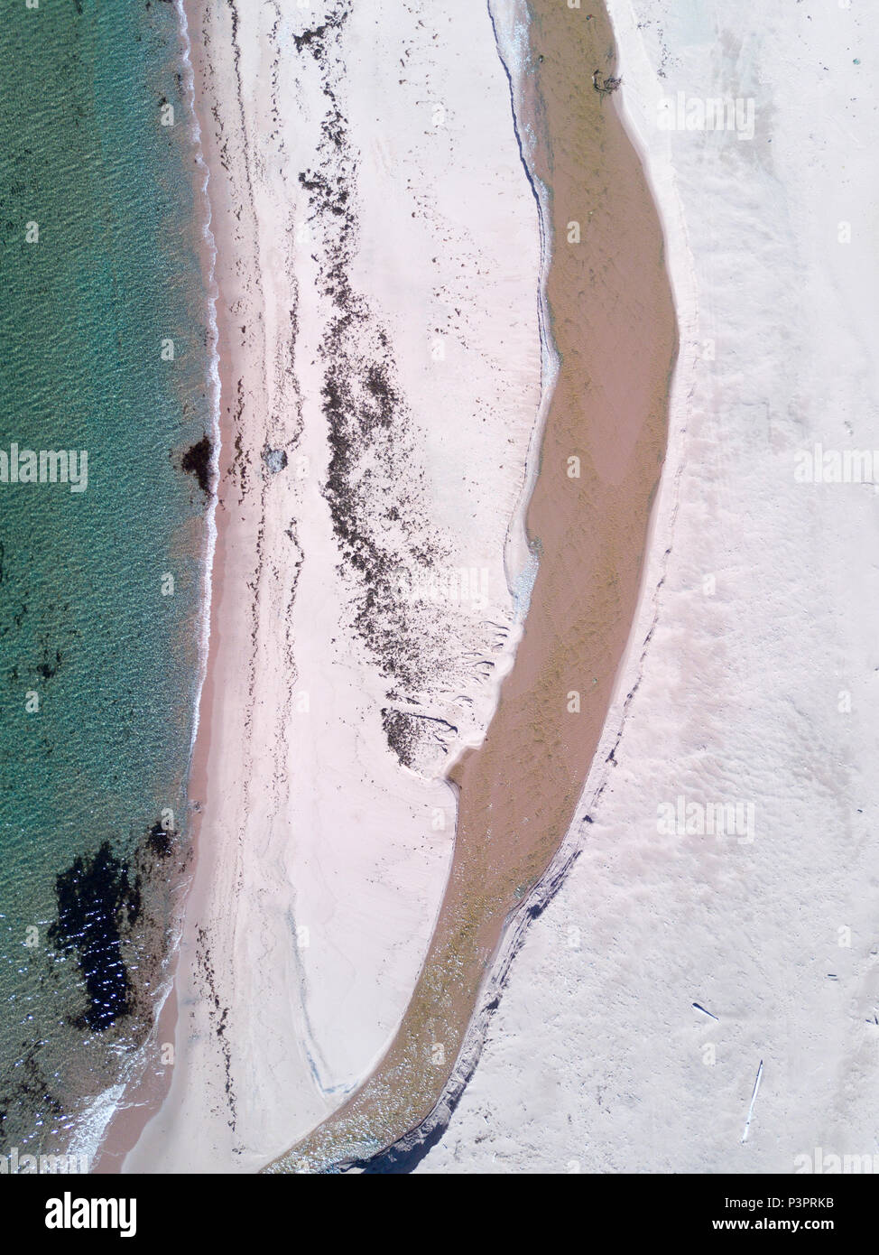 Stream crossing white sand beach, Newfoundland, Canada Stock Photo - Alamy