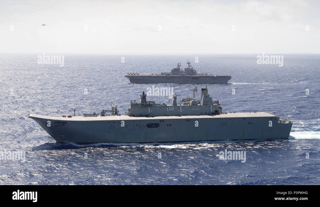 HMAS Canberra conducts a replenishment at sea (RAS) with underway ...