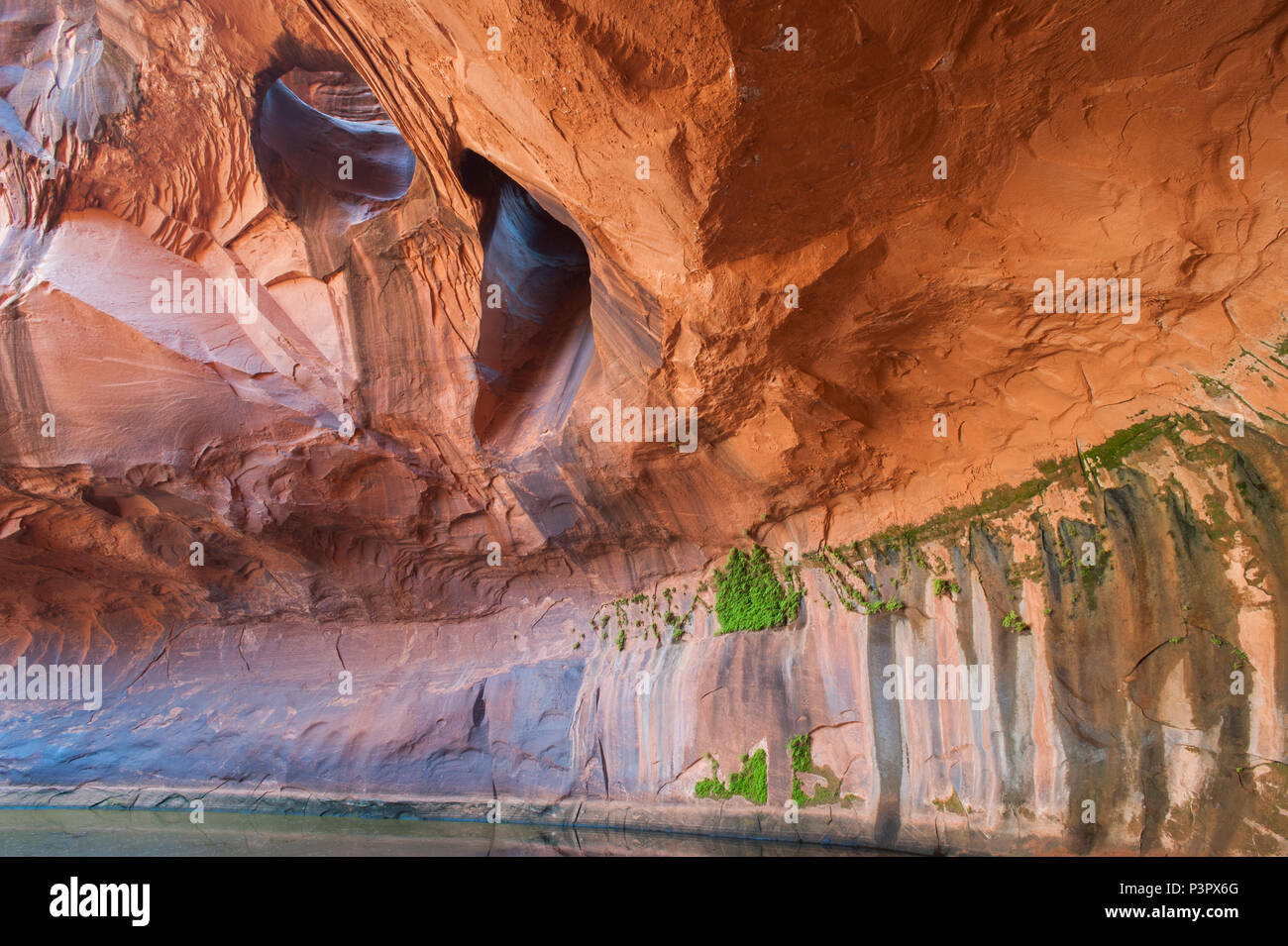 Hole in rock cliff, Golden Cathedral in Neon Canyon, Grand Staircase ...