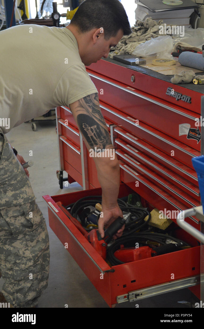 Army Reserve Spc. Martin A. Silva Bel, of 818th Support Maintenance ...