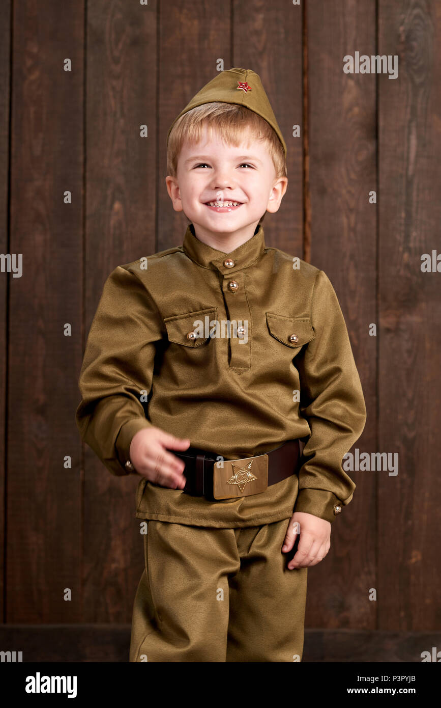 children are dressed as soldier in retro military uniforms Stock Photo ...