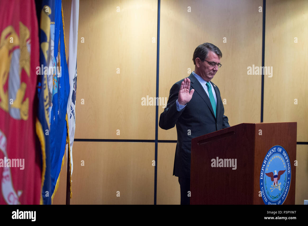 Secretary of Defense Ash Carter perform an oath of enlistment ceremony ...