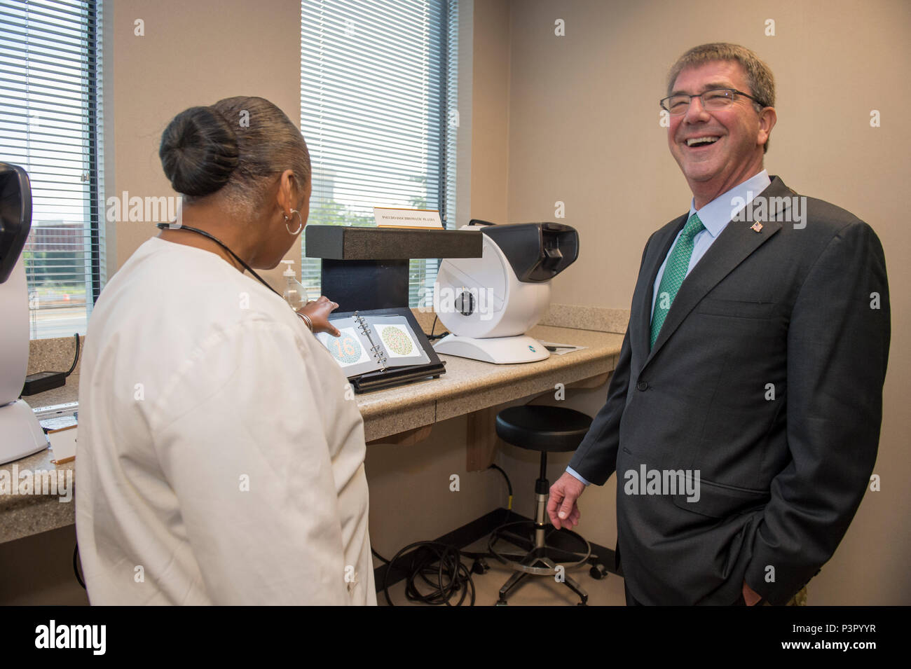 Secretary of Defense Ash Carter meets with workers during a visit to ...
