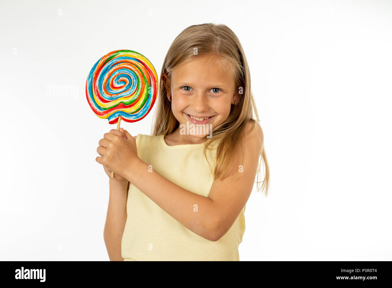 cute happy child with candy lollipop, happy girl eating big sugar ...