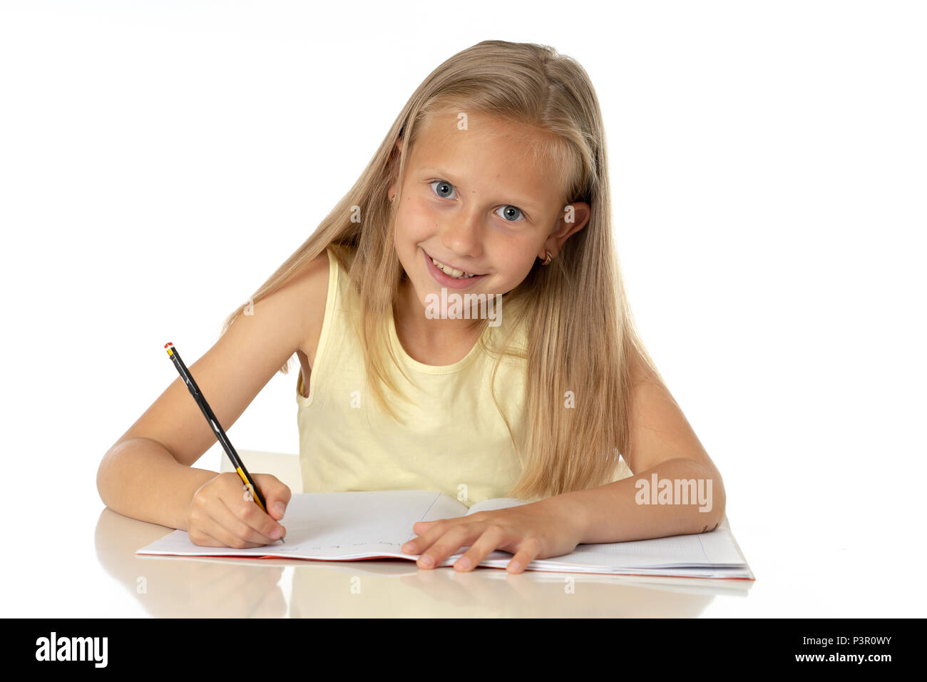 Education at home concept cute young little blonde caucasian girl studying or completing home ...