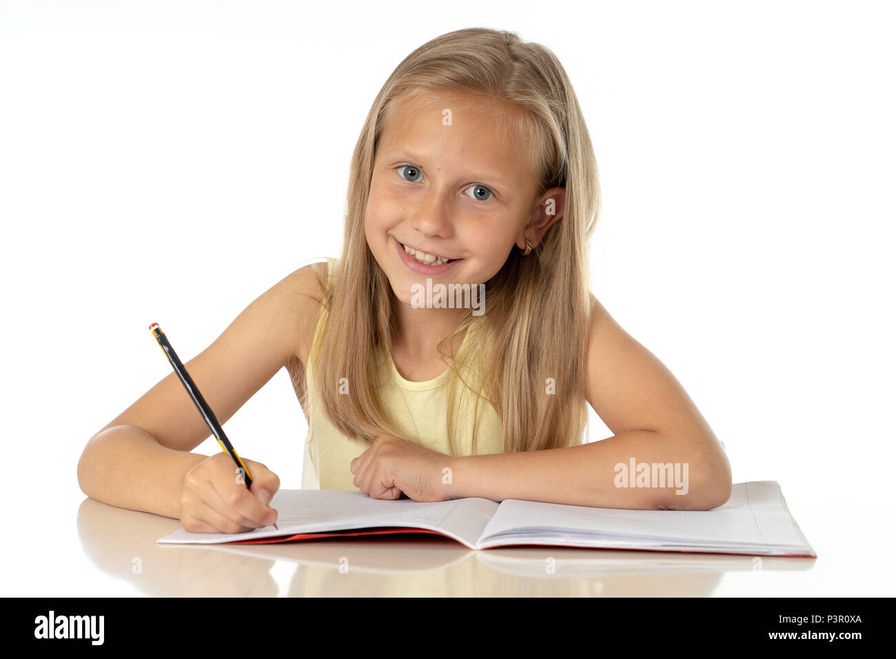 Education at home concept cute young little blonde caucasian girl studying or completing home ...
