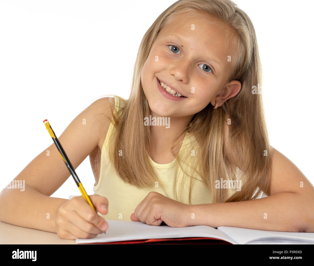 Education at home concept cute young little blonde caucasian girl studying or completing home ...