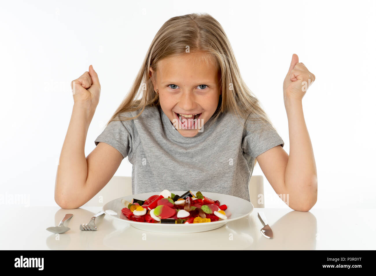 Funny happy girl with plate of candy lollipop lollies happy little girl ...