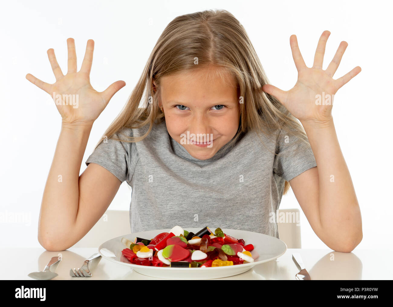 Cute funny little girl candy hi-res stock photography and images - Alamy