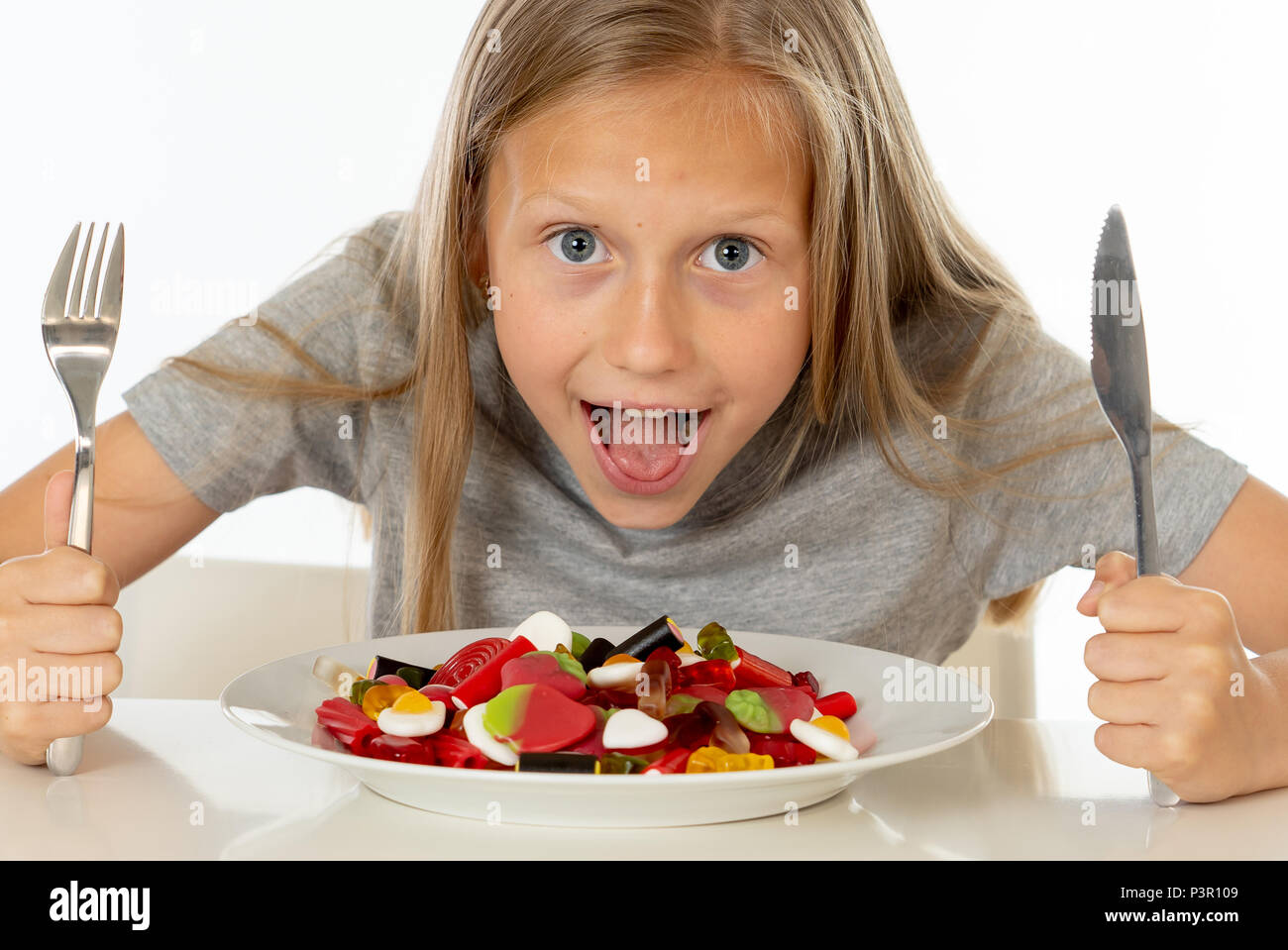 Funny happy girl with plate of candy lollipop lollies happy little girl ...