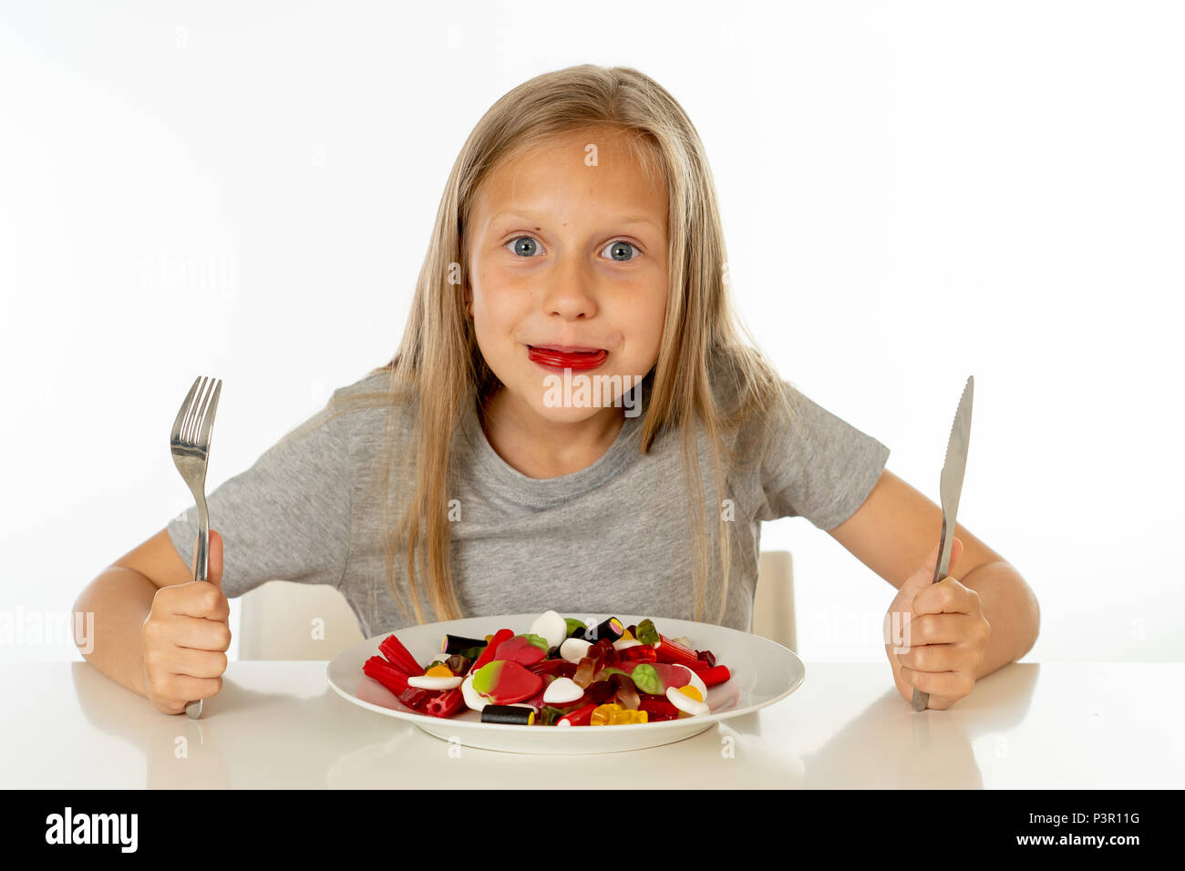 Funny happy girl with plate of candy lollipop lollies happy little girl ...