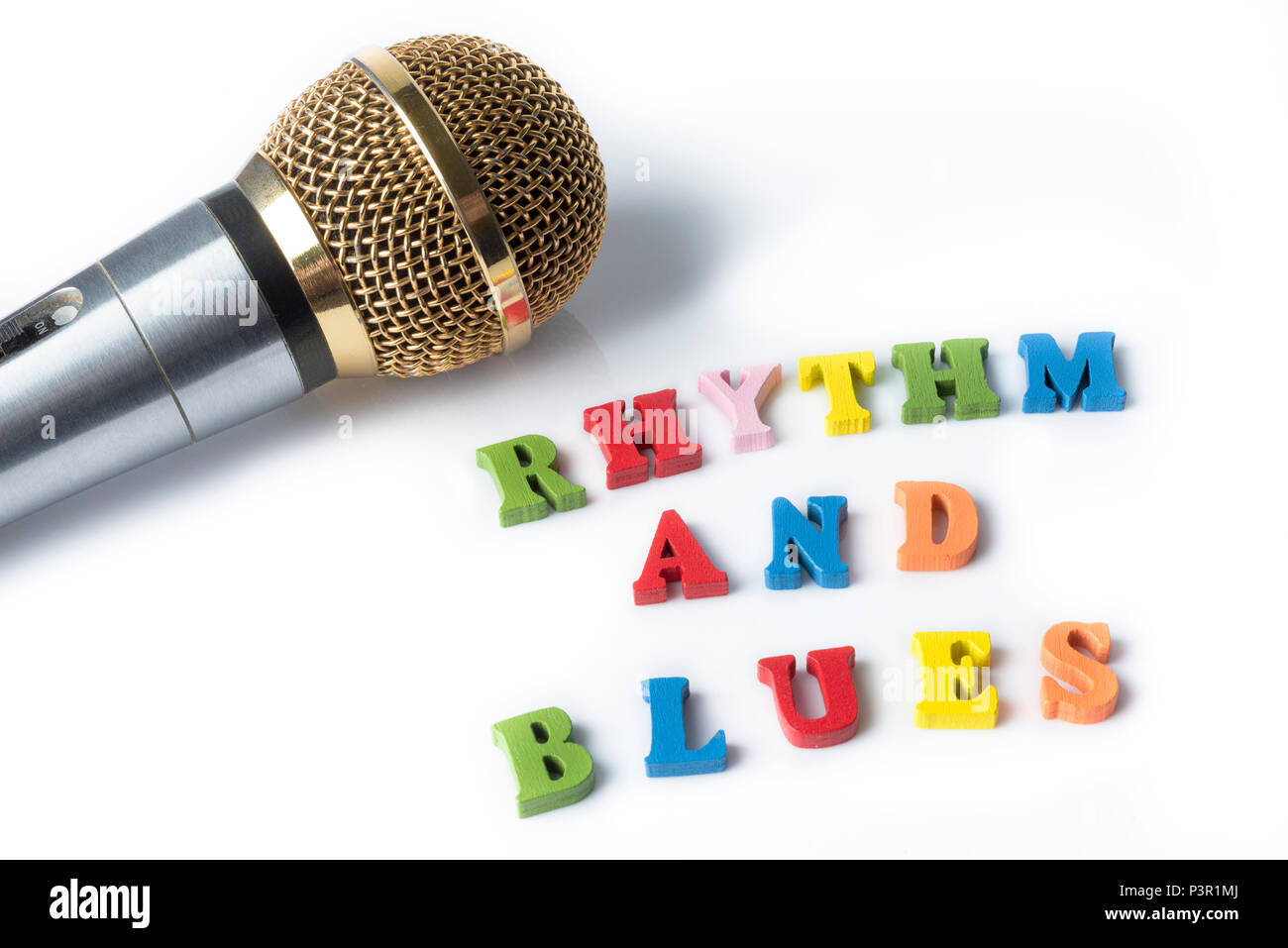Microphone on a white background with the words the RHYTHM and BLUES of ...