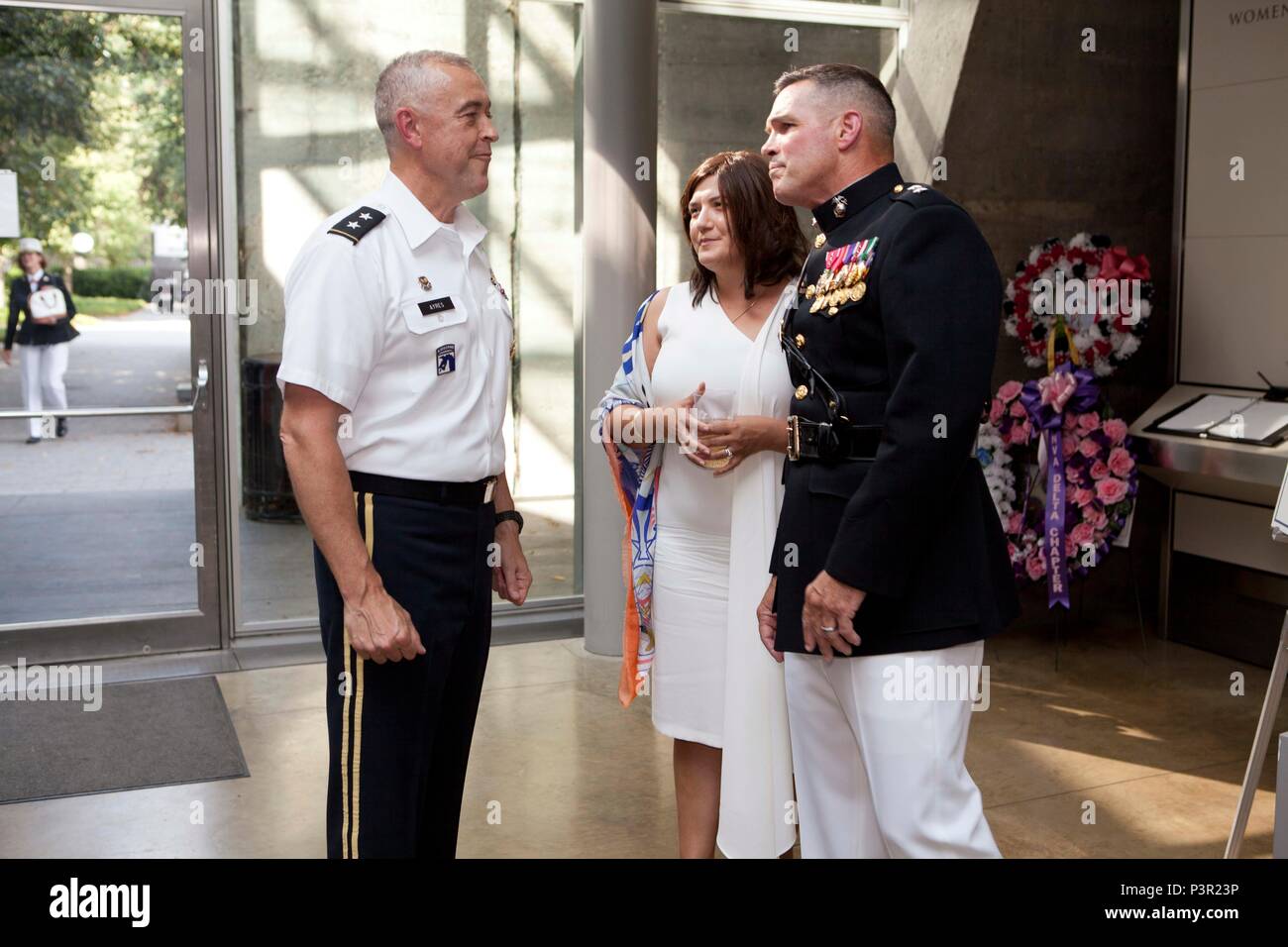 U.S. Marine Corps Maj. Gen. John Ewers, right, staff judge advocate to ...